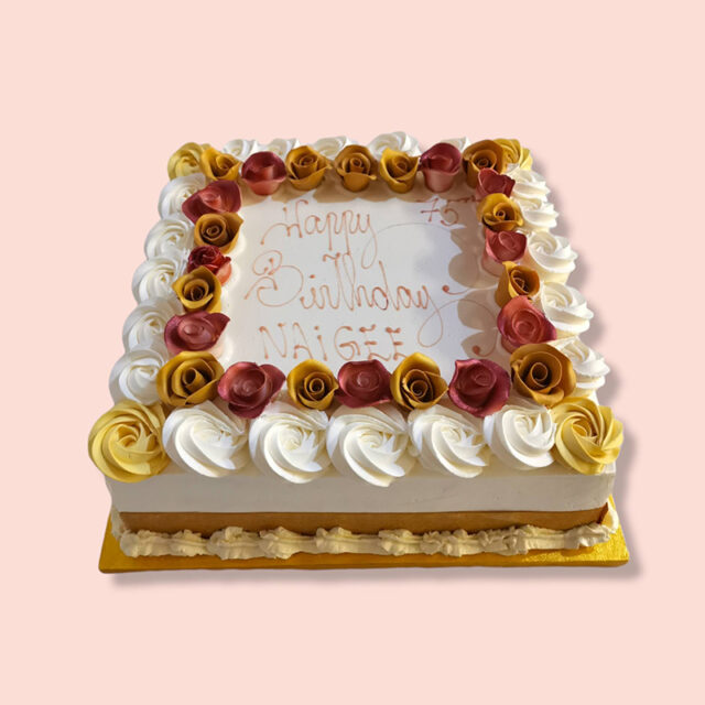 Square Gold cake with White glaze and edible gold and pink gold roses ...